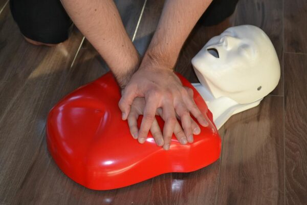 CPR performed on a man with serious injuries
